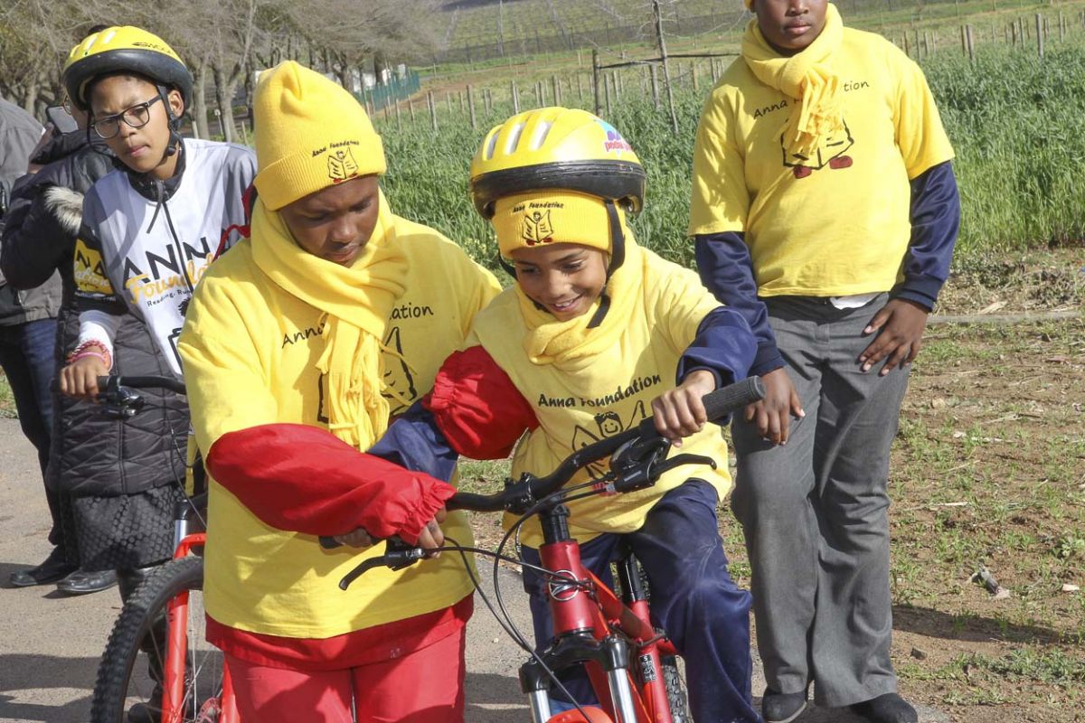 Absa Cape Epic | Anna Foundation gets its kids on a roll